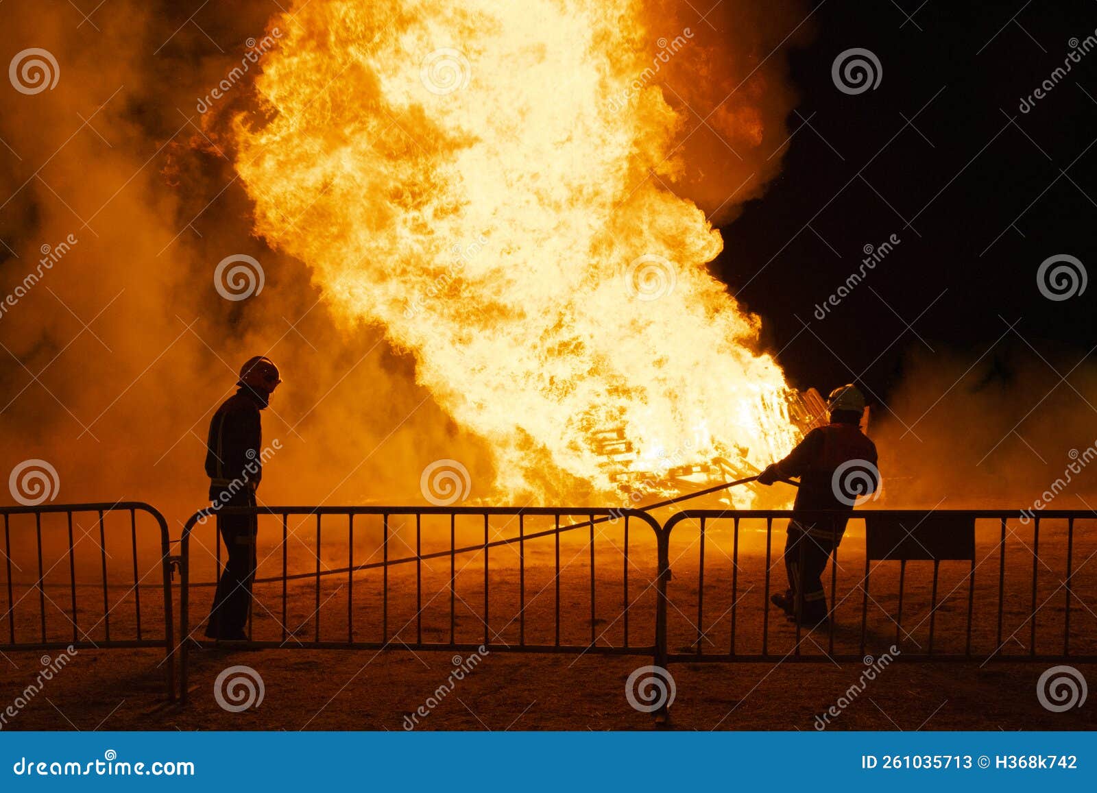 Firefighters Putting Out a Fire. Destruction and Disaster Stock Image ...