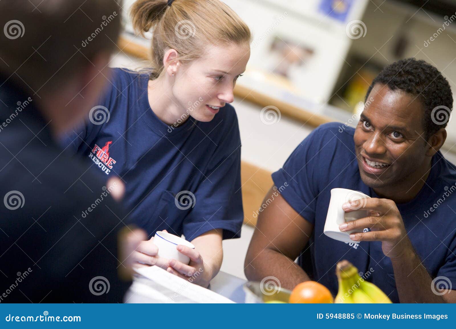 Firefighters Relaxing in the Staff Kitchen Stock Image - Image of ...