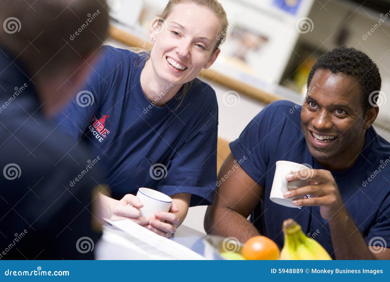 Firefighters Relaxing in the Staff Kitchen Stock Image - Image of ...