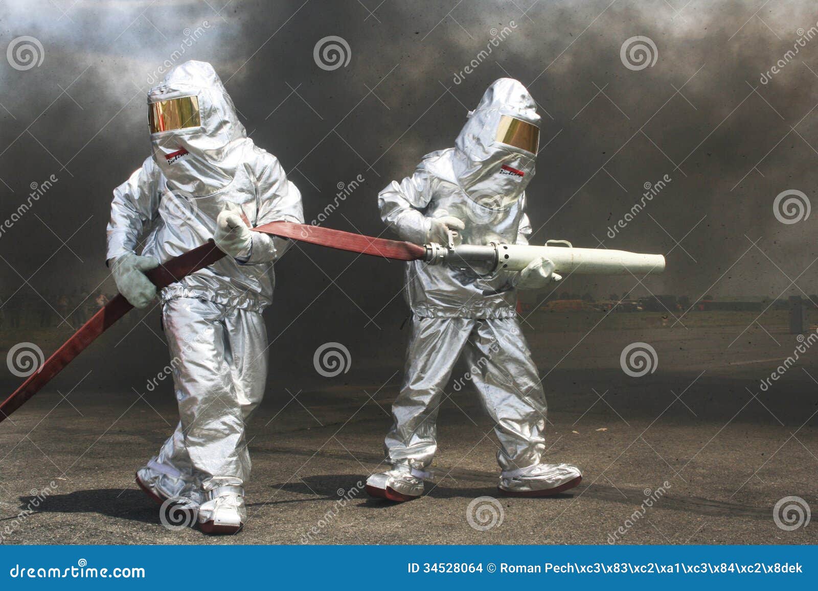 Firefighters editorial stock image. Image of nozzles - 34528064