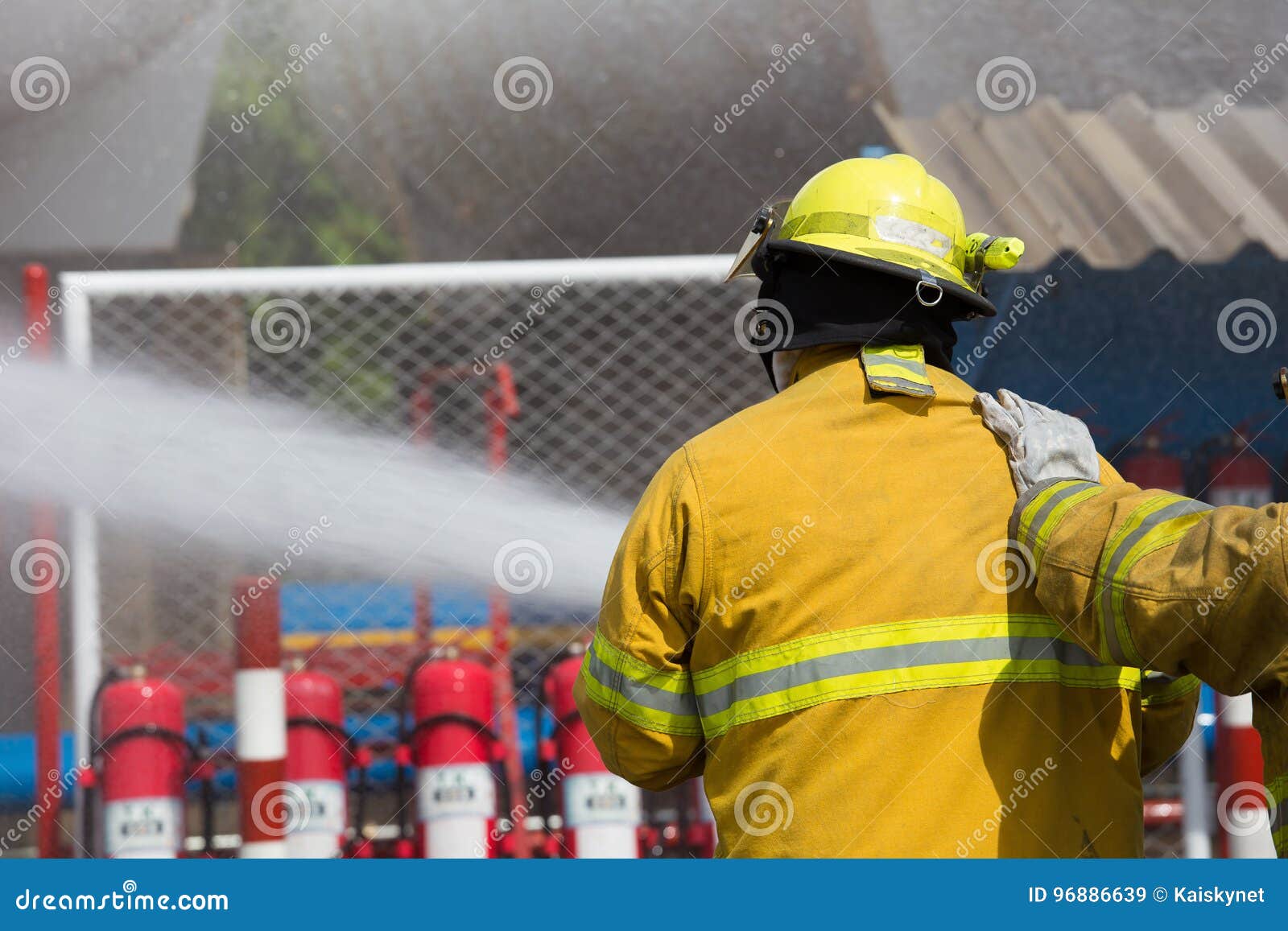 Firefighters Spray Water in Fire Extinguishers Caused by Explosive Gas ...