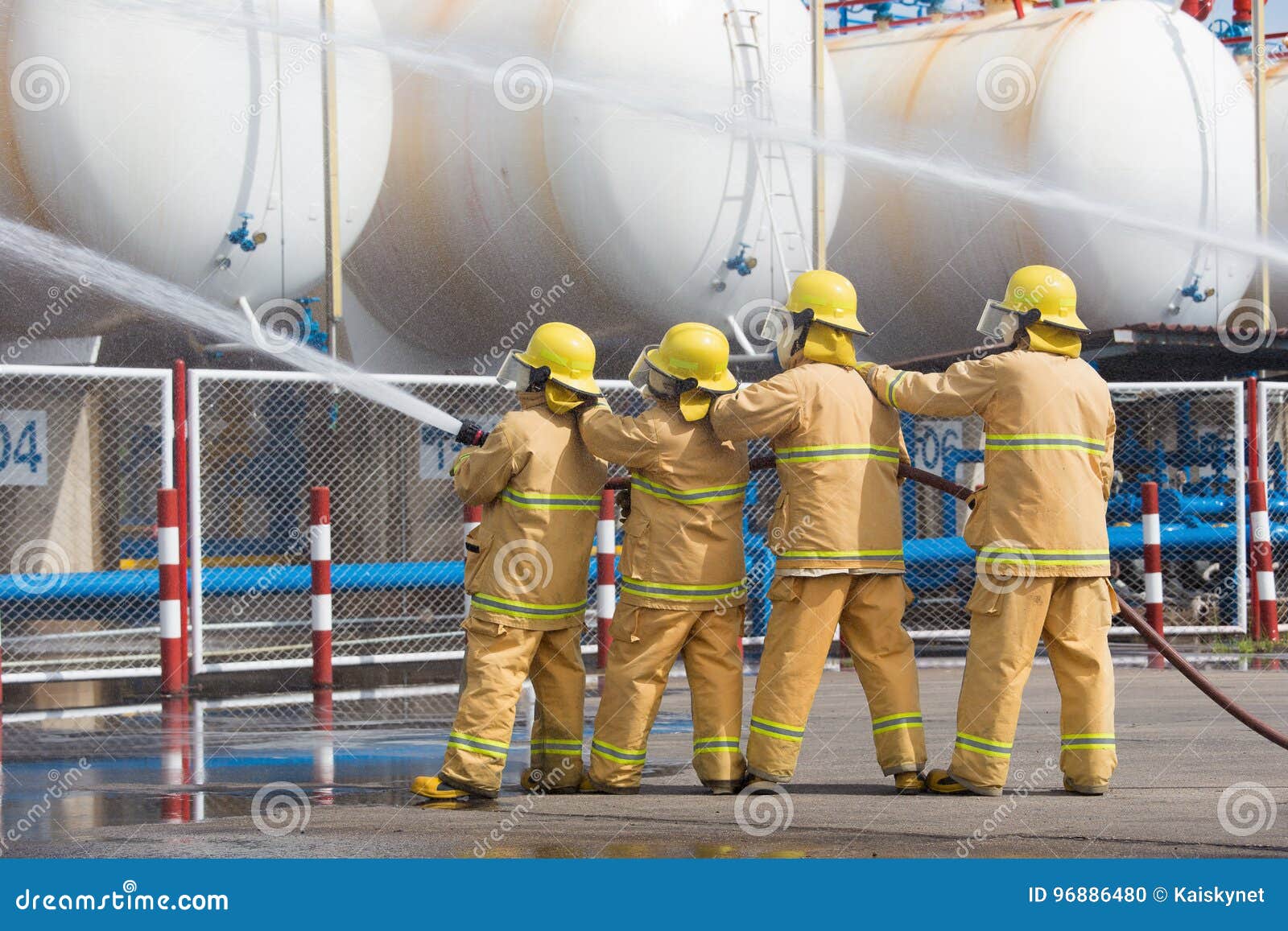 Firefighters Spray Water in LPG Gas Tanks, Fire Extinguishers Ca Stock ...