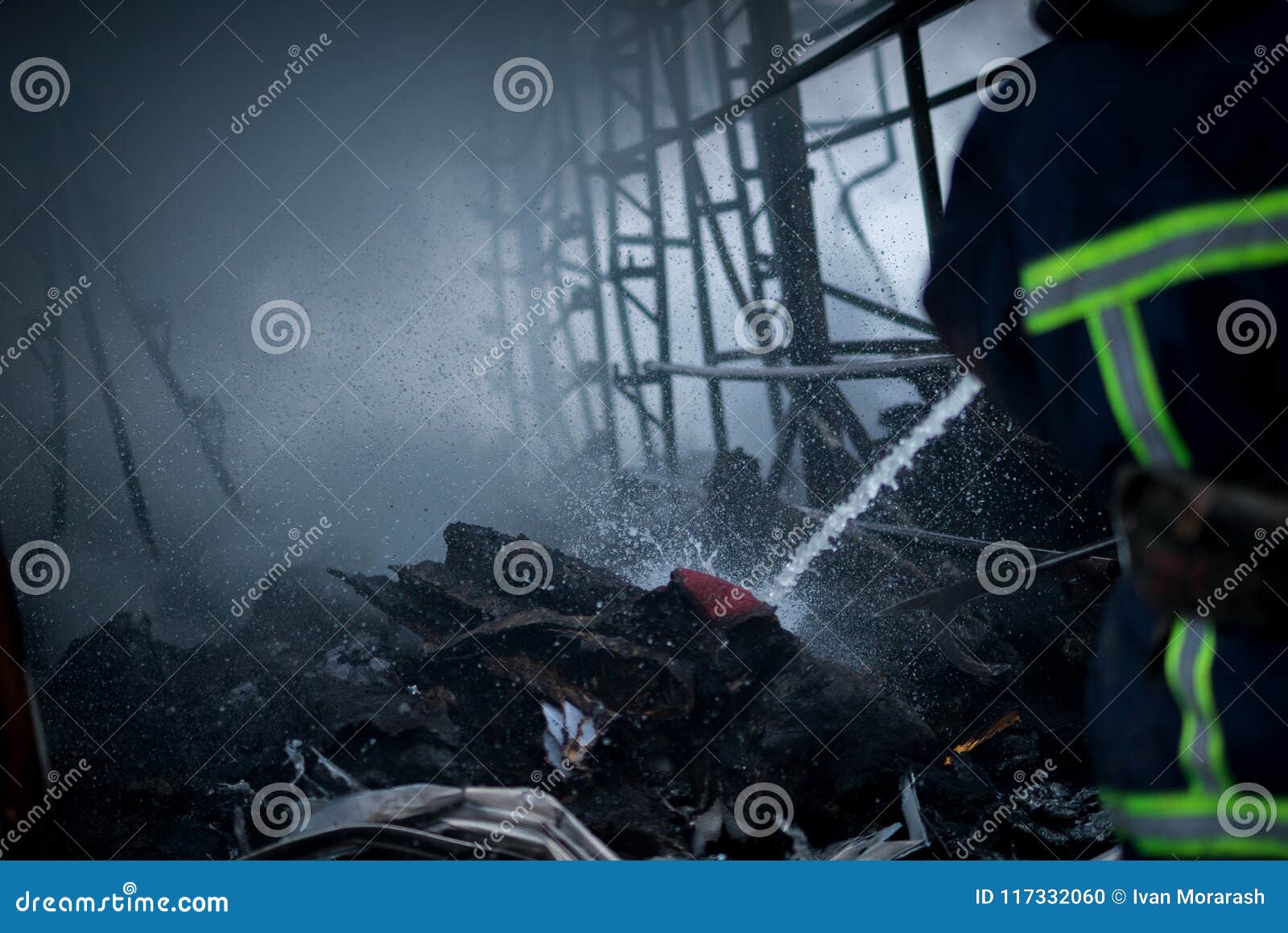 Firefighters Spray Water. Smoke and Buiding after Fire Editorial Image ...