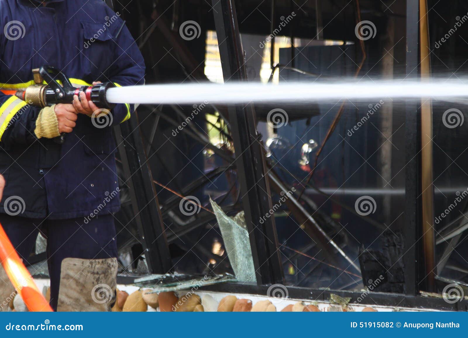 Firefighters Spray Water To Wildfire Stock Photo - Image of protection ...