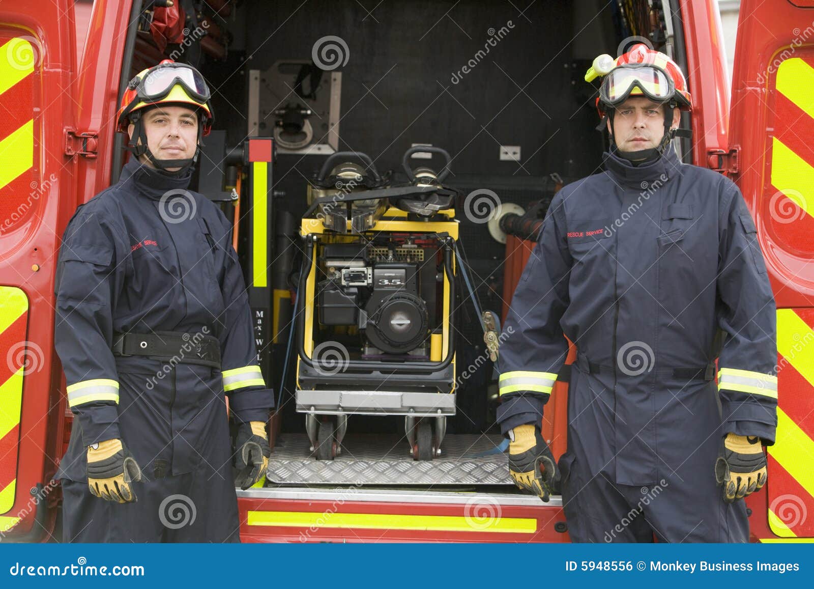 Firefighters Standing by the Equipment Stock Photo - Image of duty ...