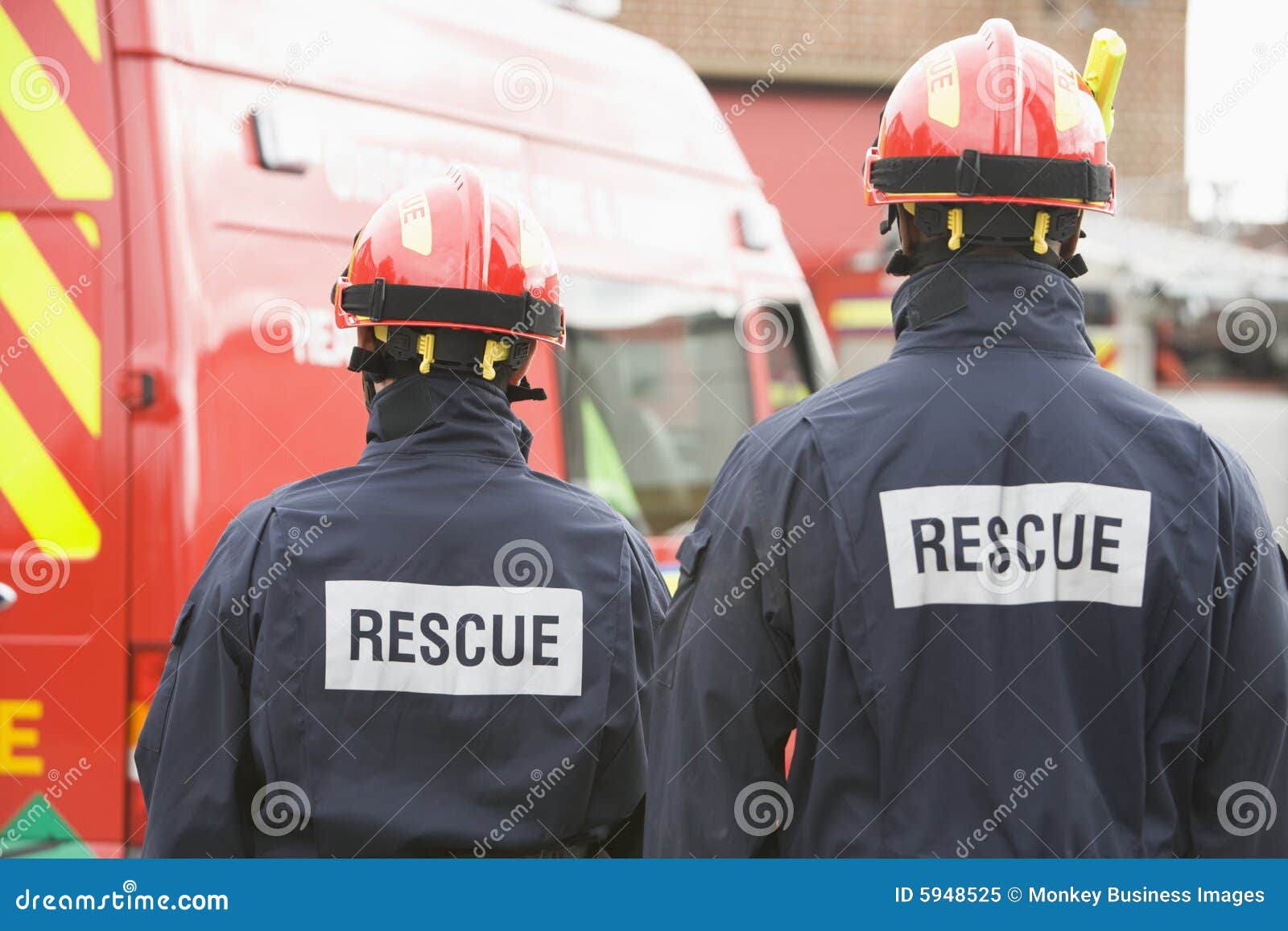 Firefighters Standing by a Small Fire Engine Stock Image - Image of ...
