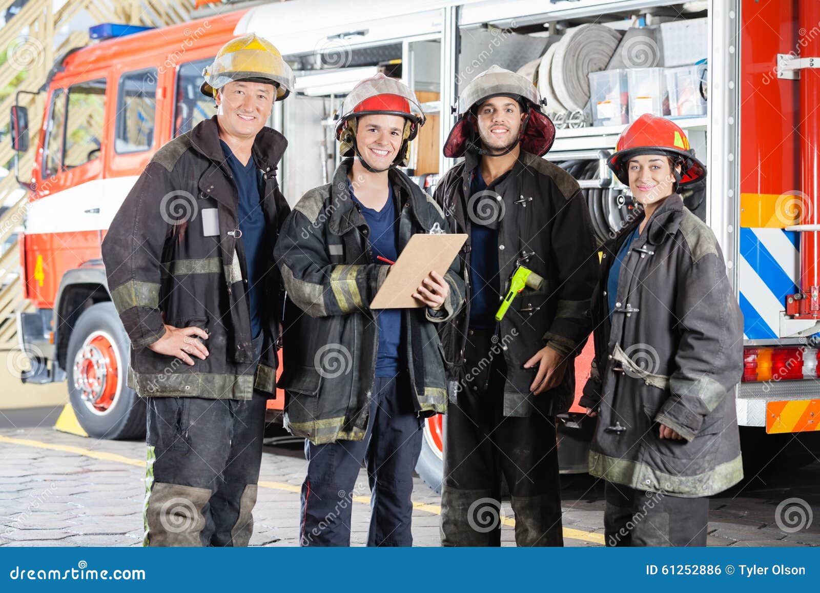 Firefighters Standing Together at Fire Station Stock Photo - Image of ...