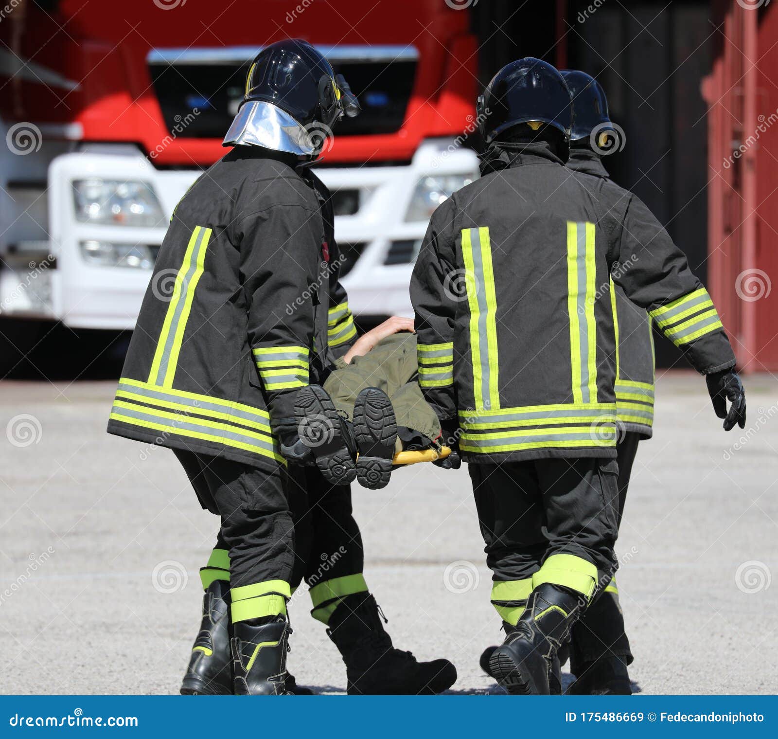 Firefighters and a Stretcher with Person Stock Image - Image of helper ...