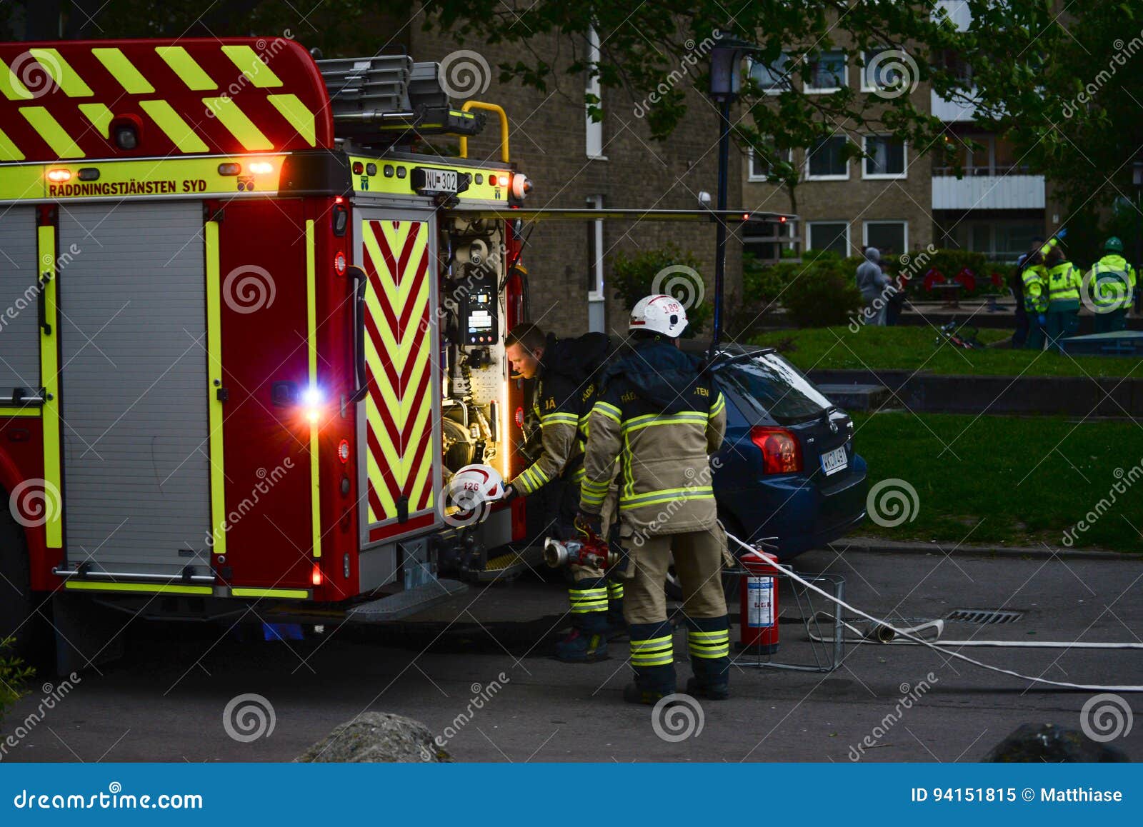 Firefighters in Sweden stock image. Image of hoses, roadway - 94151815