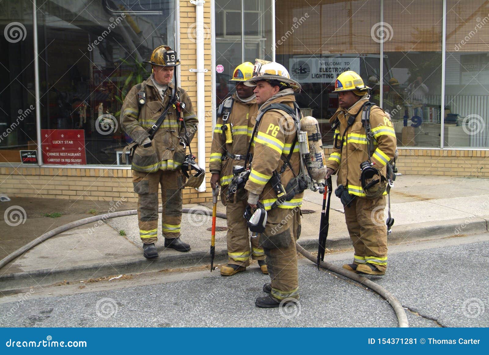 Firefighters Take A Break And Take A Breather After Fighting A