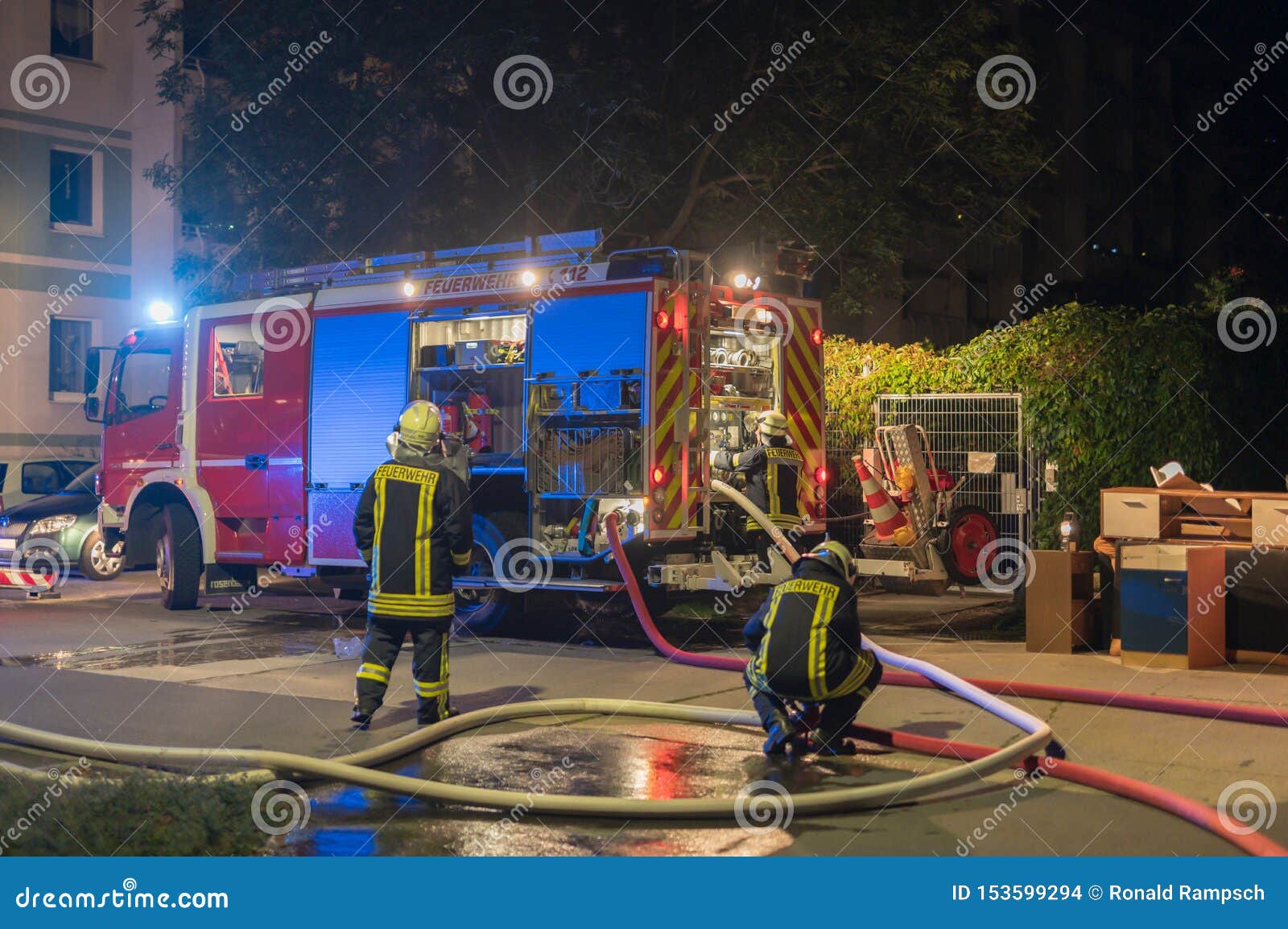 Firefighters at the Scene at Night Stock Photo - Image of hoses, helper ...