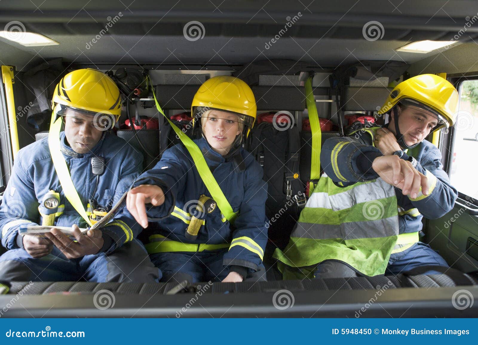 Firefighters on Their Way To an Emergency Scene Stock Photo - Image of ...