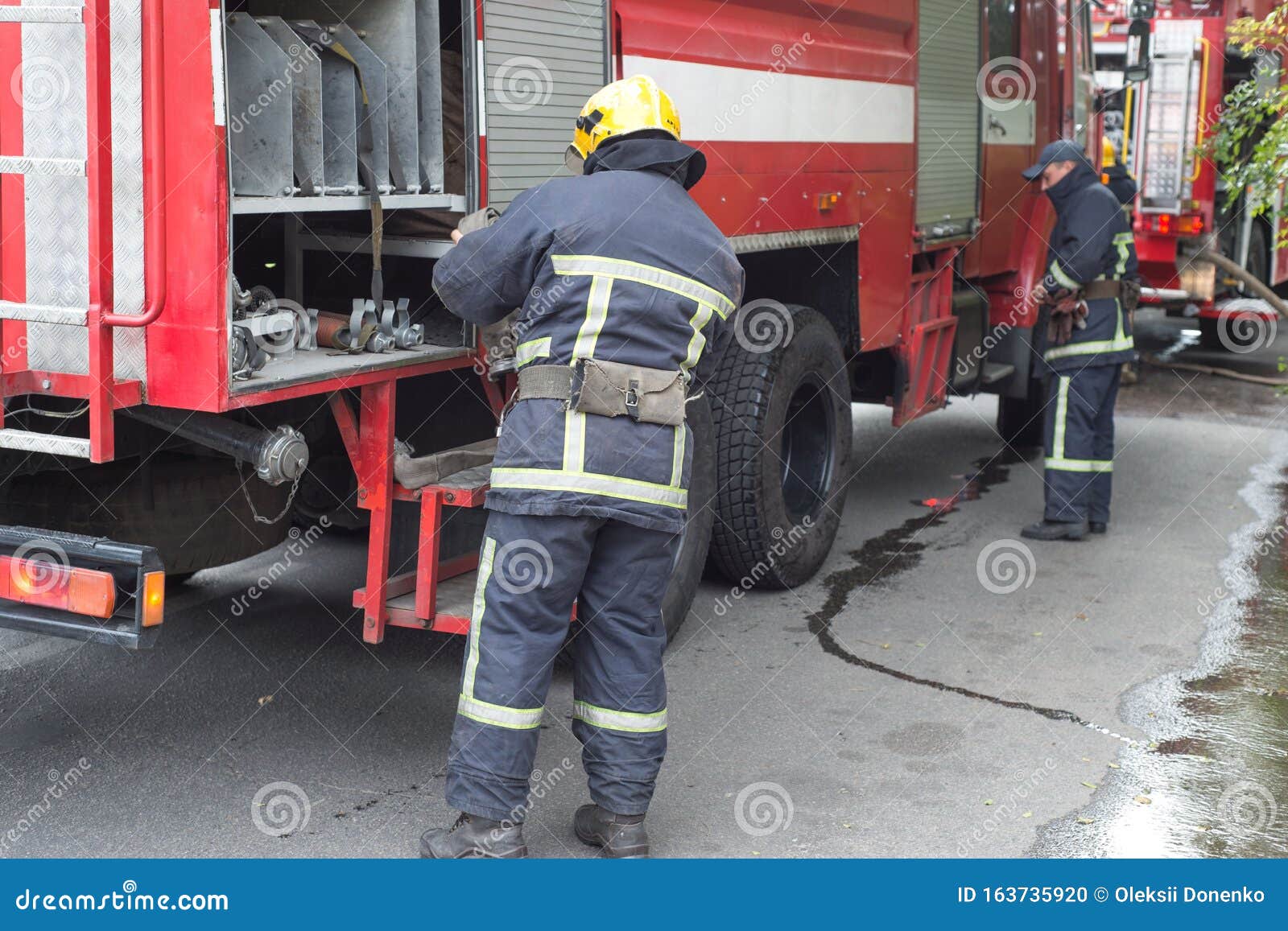 Firefighters Training, Foreground is Drop of Water Springer, Selective ...