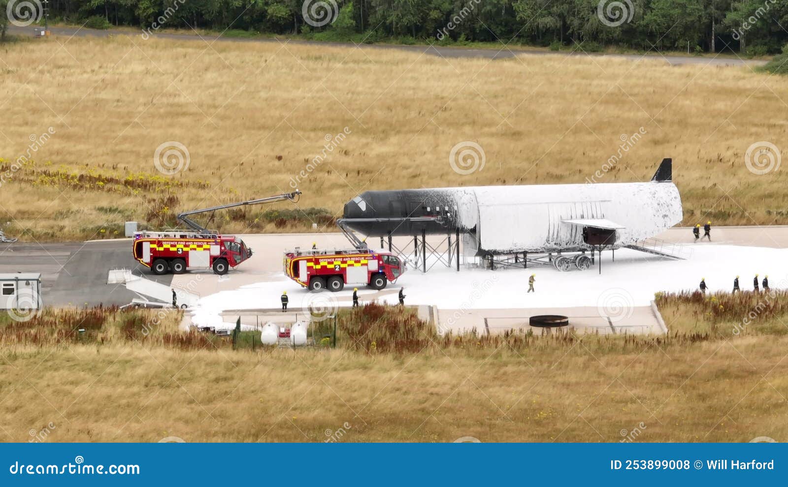 Firefighters Training To Tackle a Fire of a Dummy Aircraft Stock ...