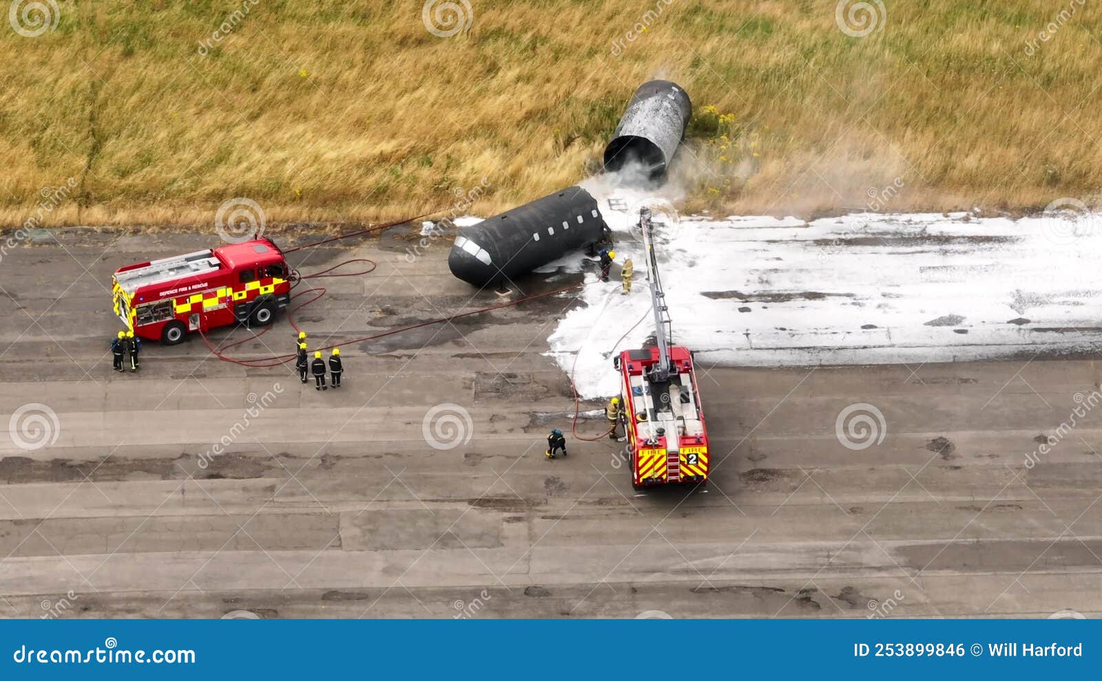 Firefighters Training To Tackle a Fire of a Dummy Aircraft Stock ...
