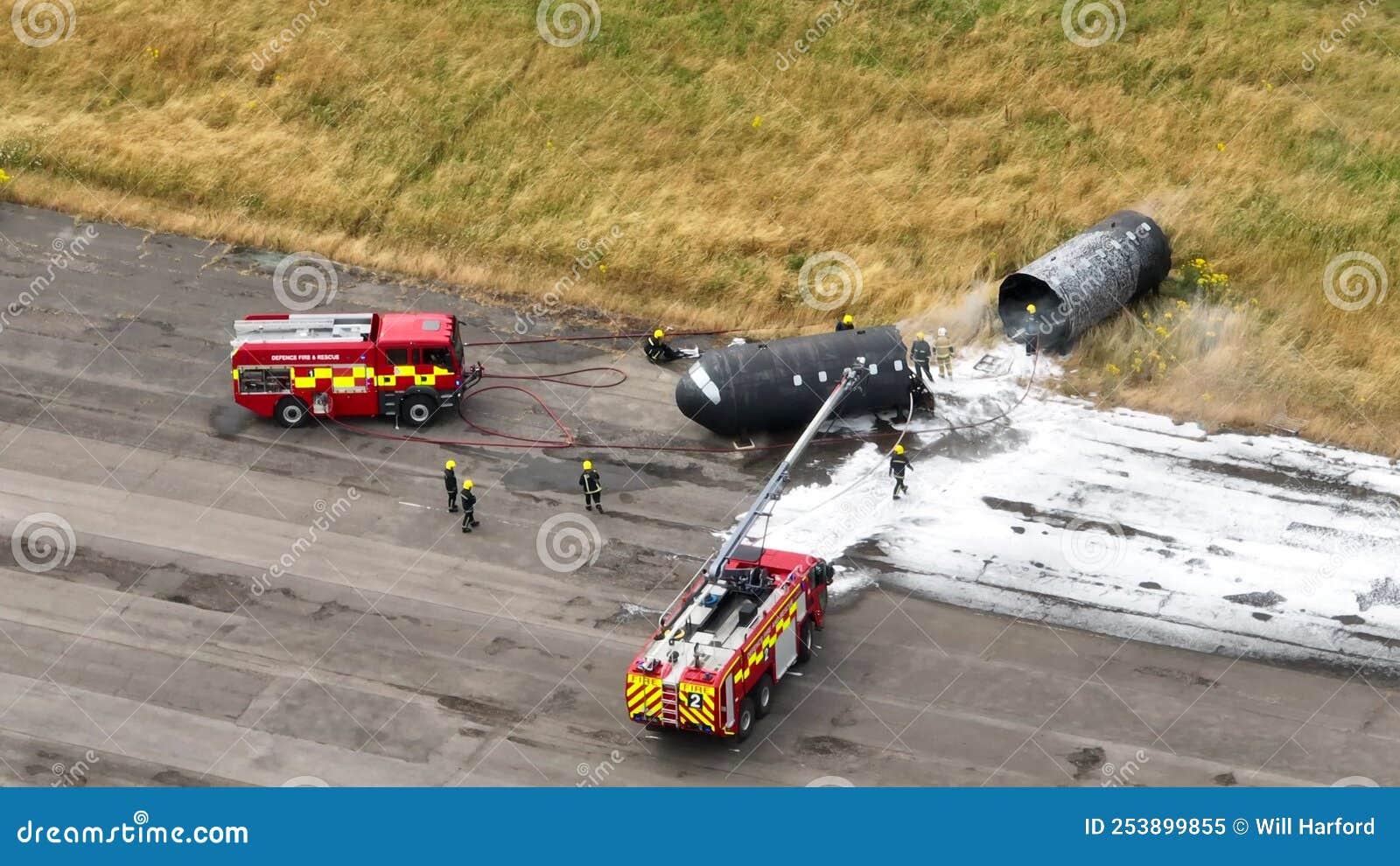 Firefighters Training To Tackle a Fire of a Dummy Aircraft Stock Video ...