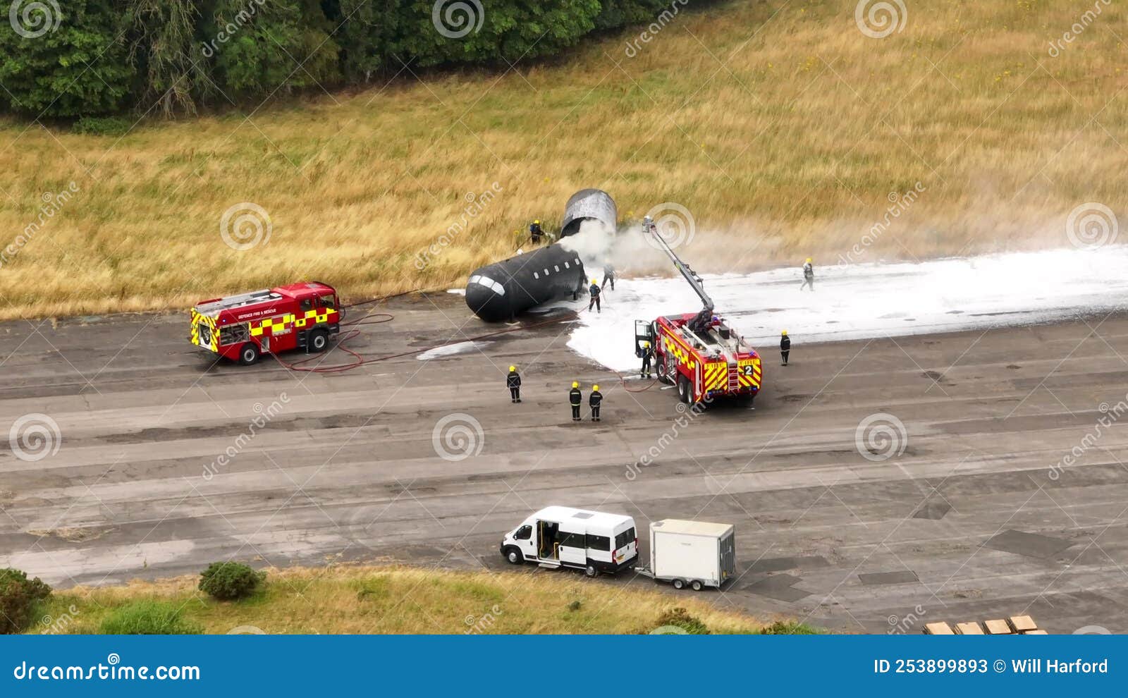 Firefighters Training To Tackle a Fire of a Dummy Aircraft Stock Video ...