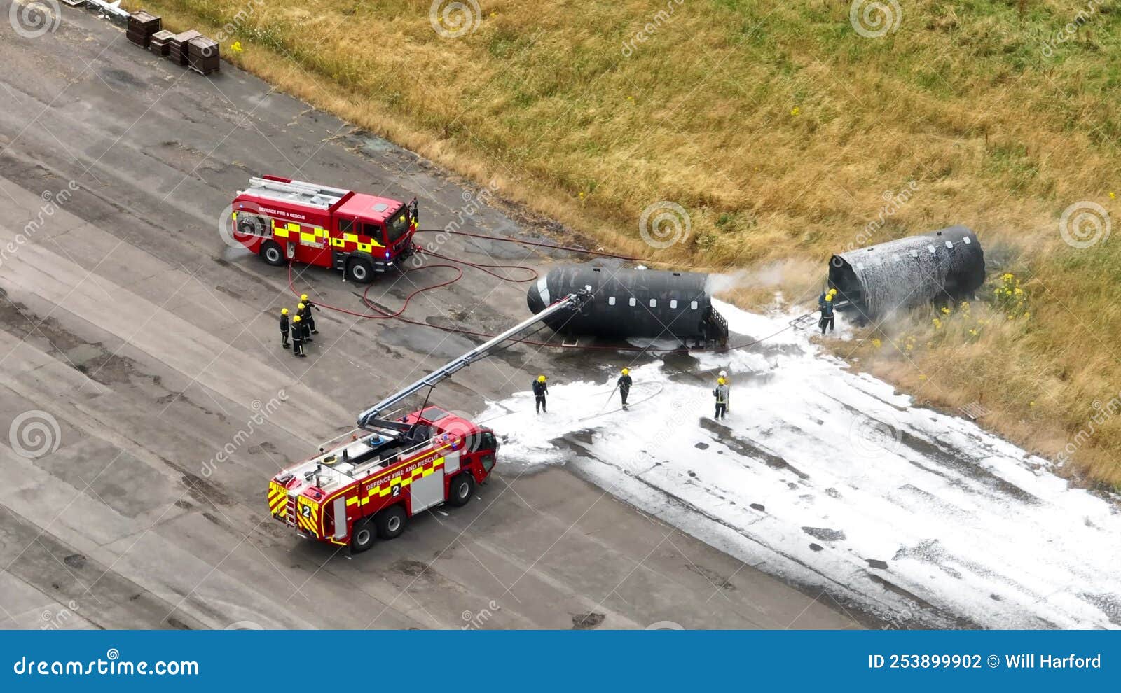 Firefighters Training To Tackle a Fire of a Dummy Aircraft Stock ...