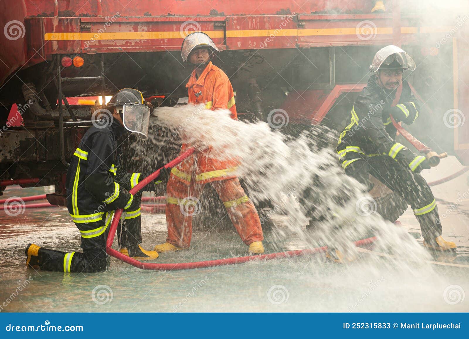 Firefighters Use Powerful Water To Extinguish the Fire. during the Fire ...