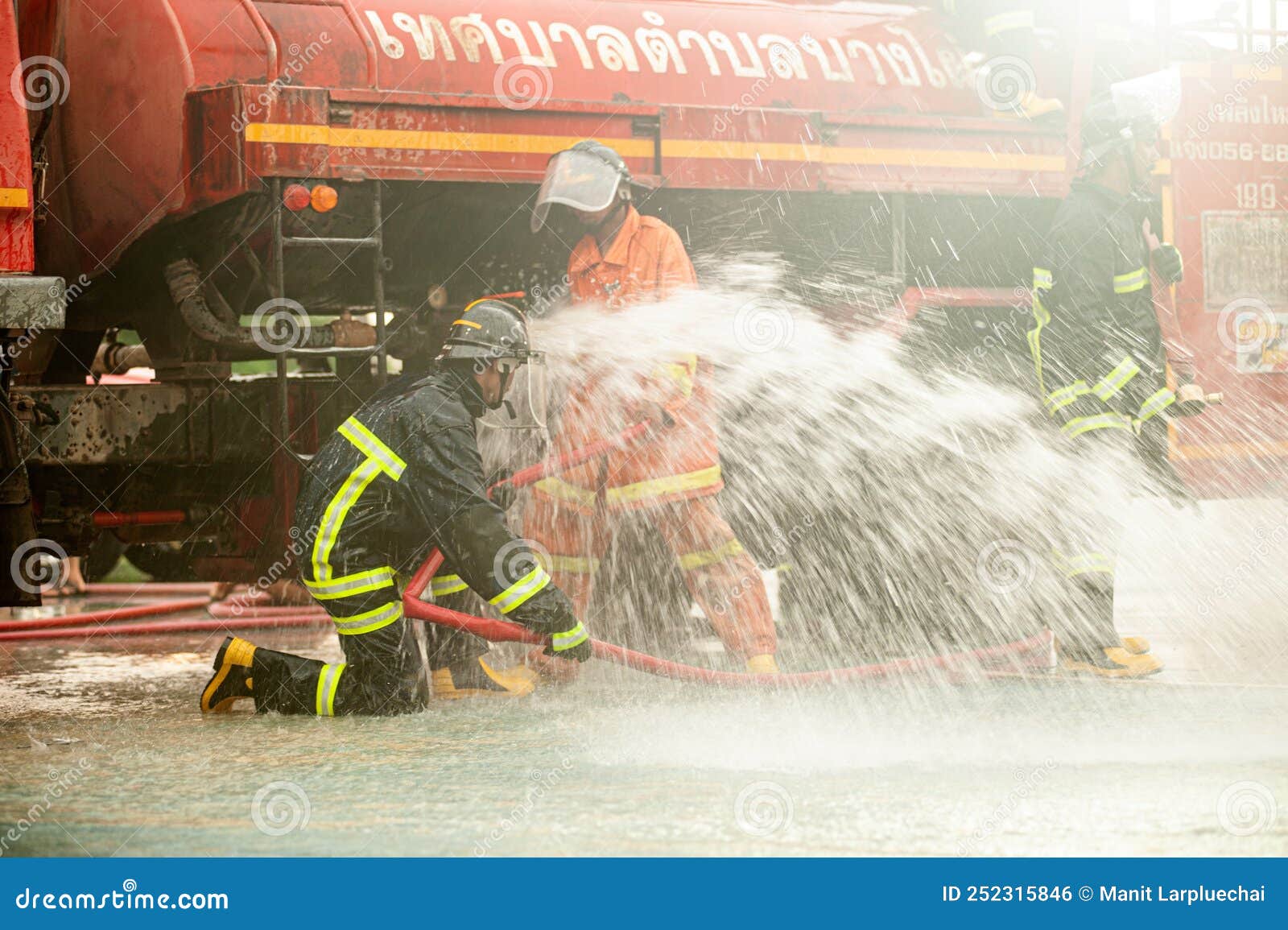 Firefighters Use Powerful Water To Extinguish the Fire. during the Fire ...