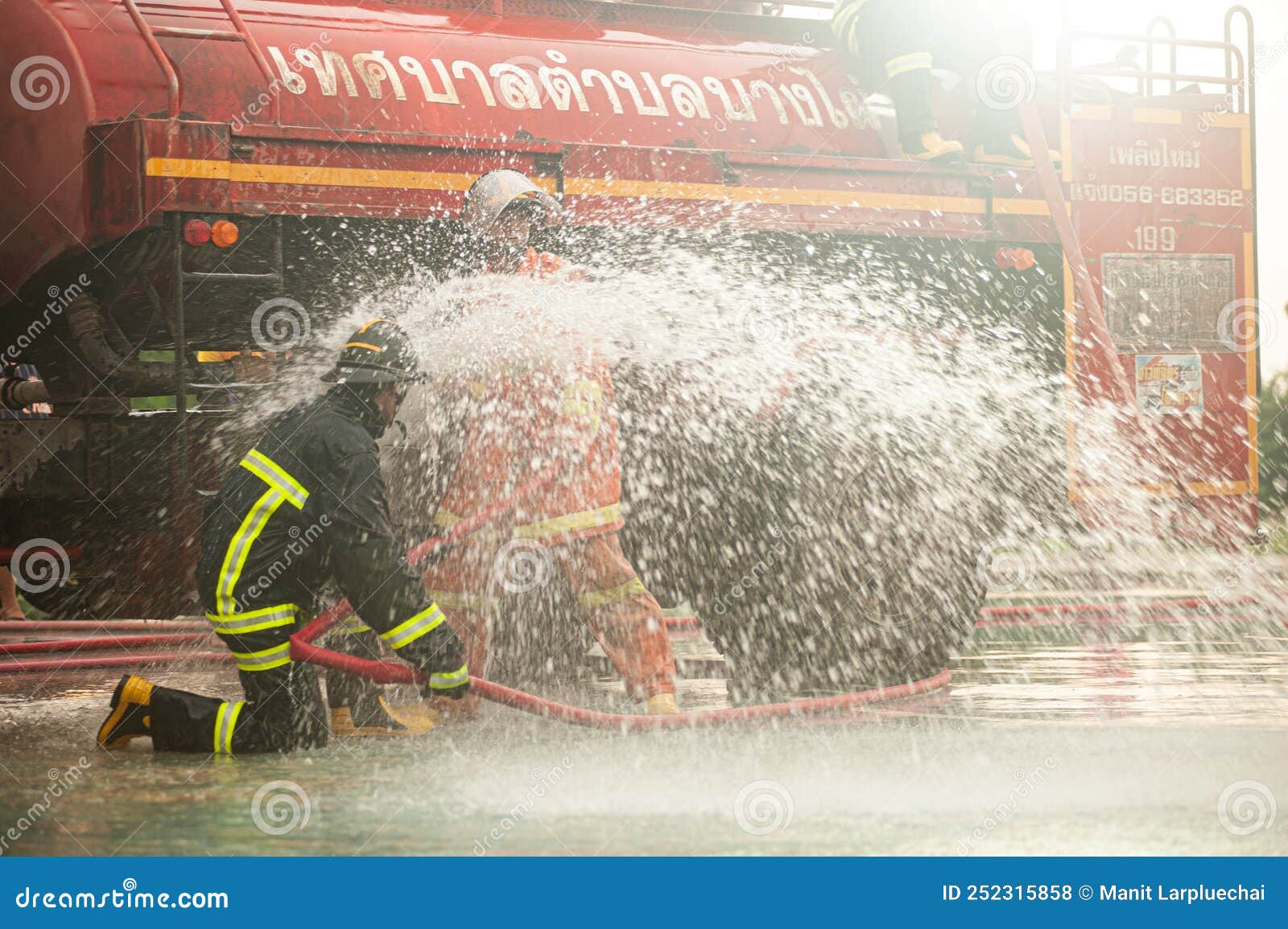 Firefighters Use Powerful Water To Extinguish the Fire. during the Fire ...