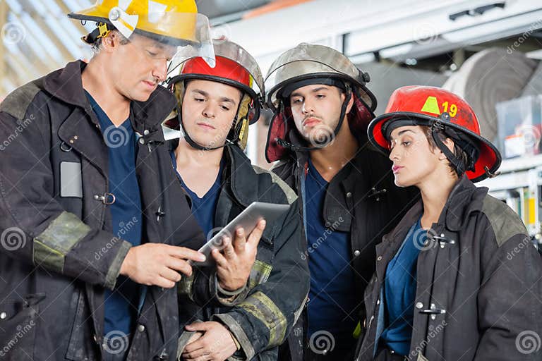 Firefighters Using Tablet Computer Stock Image - Image of education ...