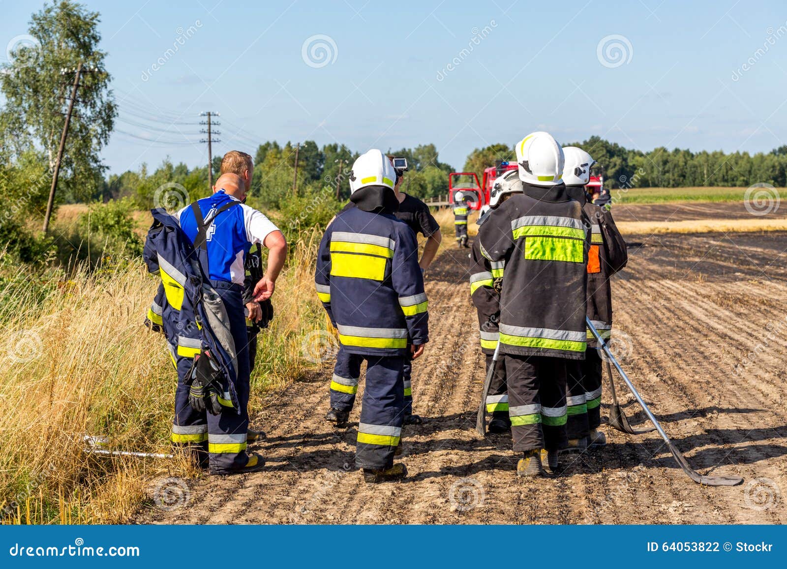 Firefighters Walking on the Field on Fire Editorial Photography - Image ...