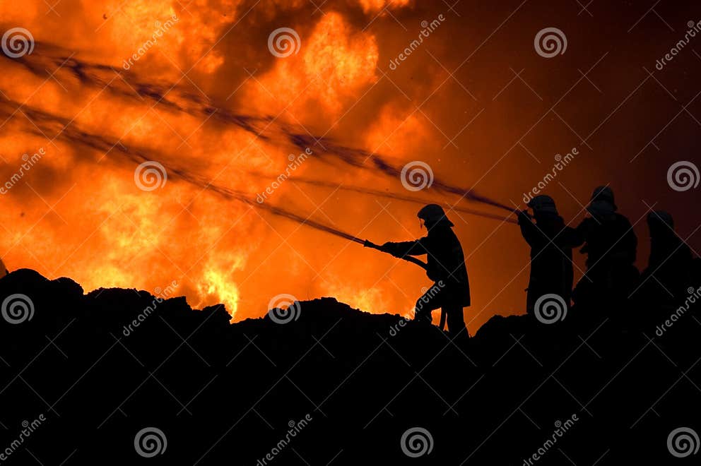 Firefighters at work stock image. Image of shadow, firemen - 2183683
