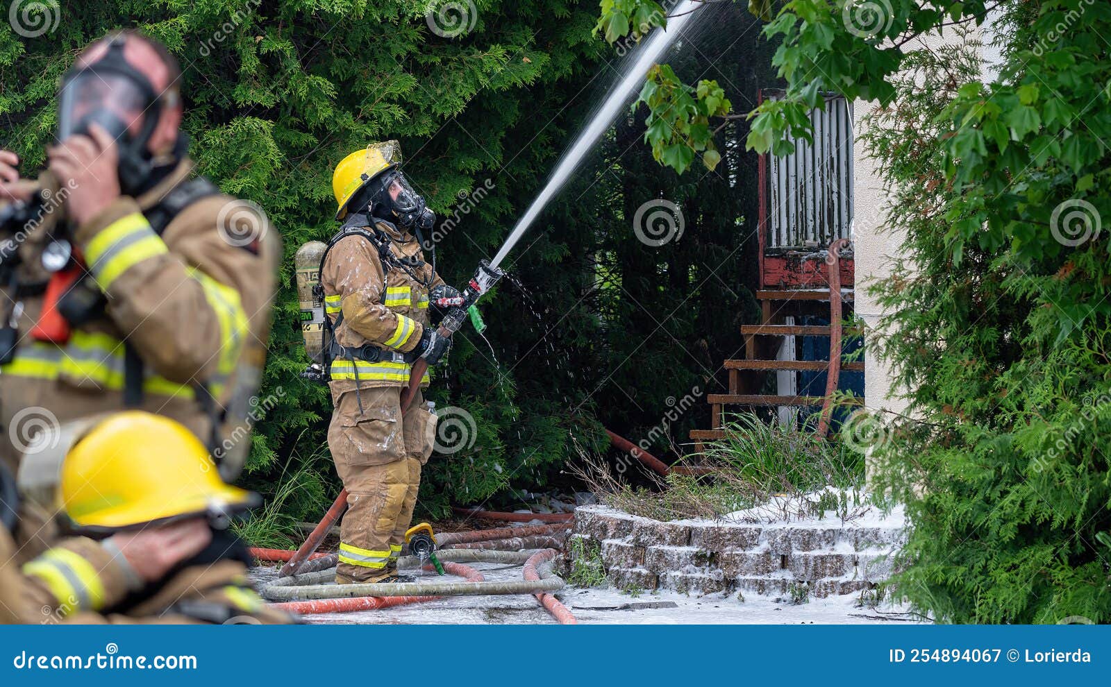 Firefighters at Work during a House Fire Editorial Photography - Image ...