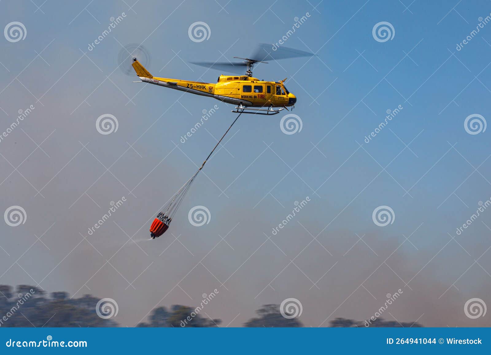 Firefighting Helicopter Extinguishes A Fire Editorial Stock Image