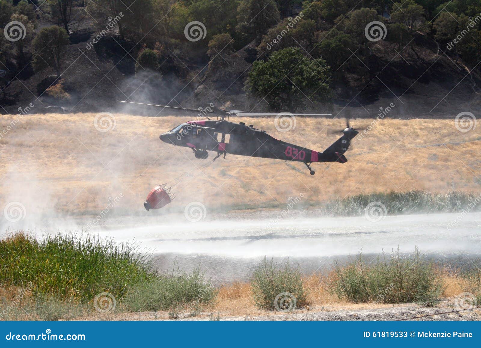 Firefighting Helicopter Refills Water Bucket Stock Image - Image of ...