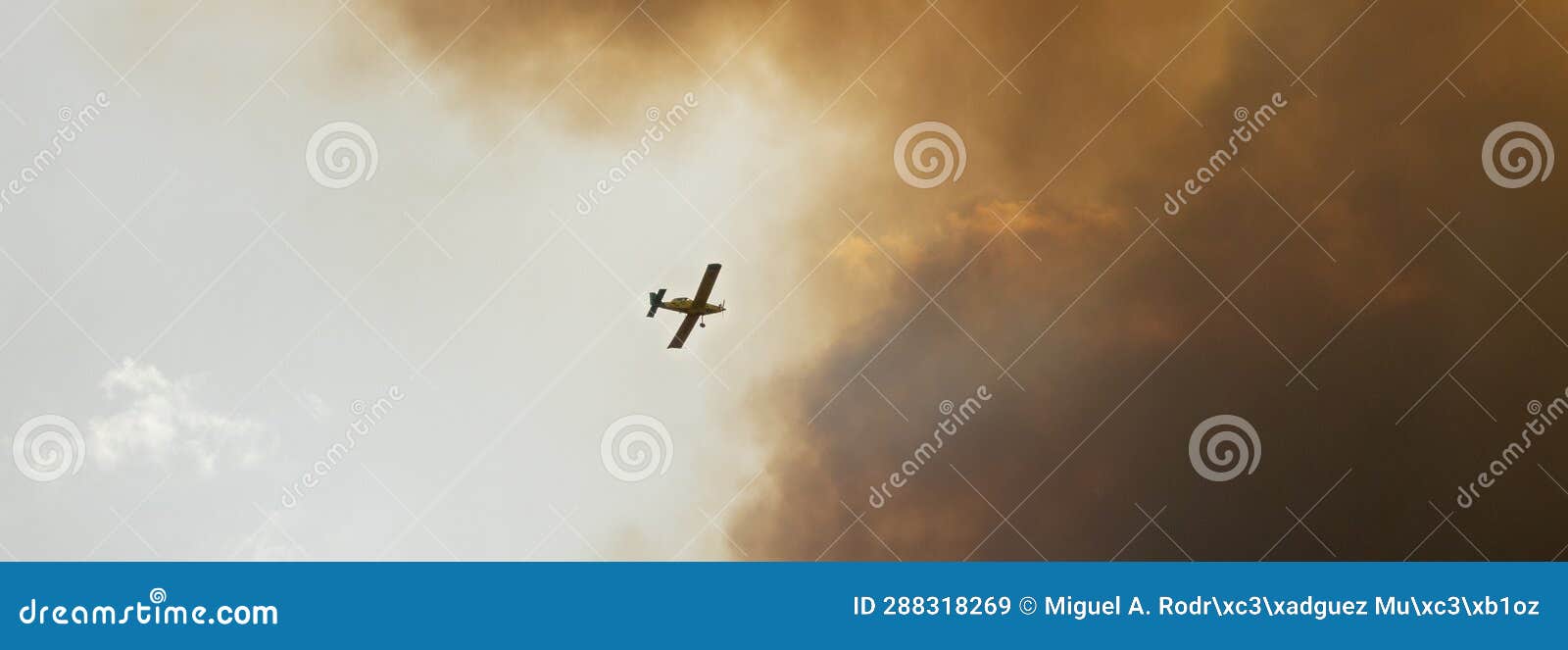 Firefighting Plane Flying into a Large Cloud of Smoke Stock Image ...
