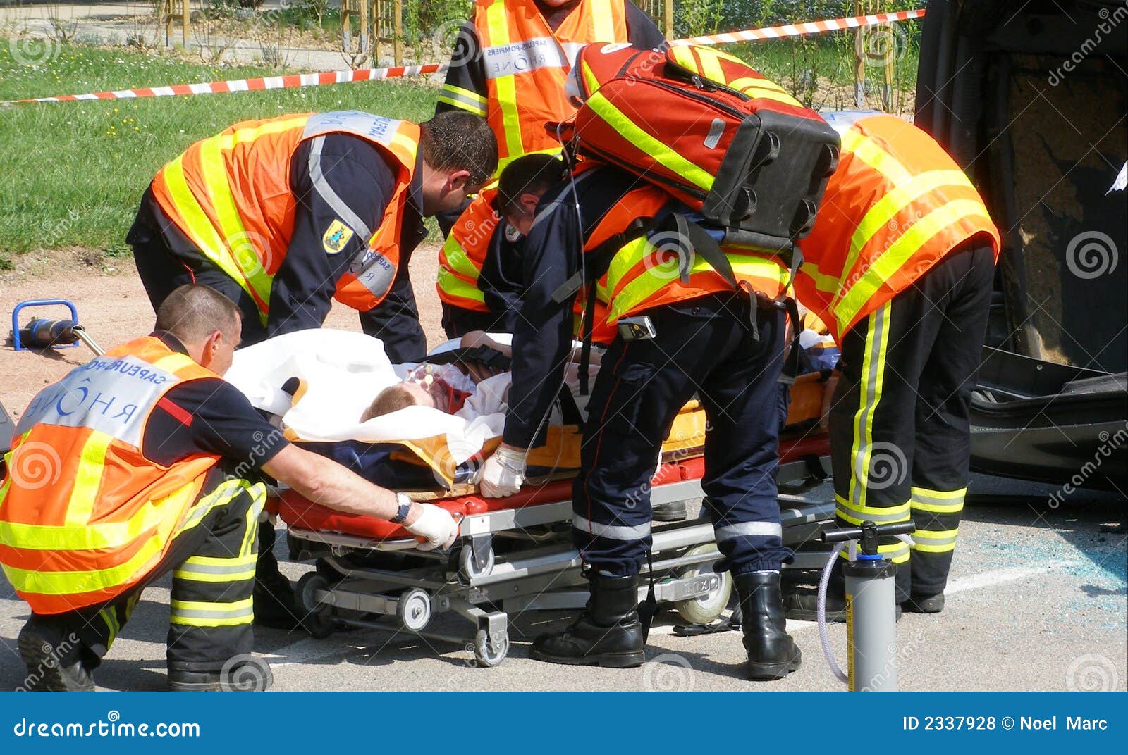 Fireman And Doctor Taking Out Victim From Car Stock Photography ...