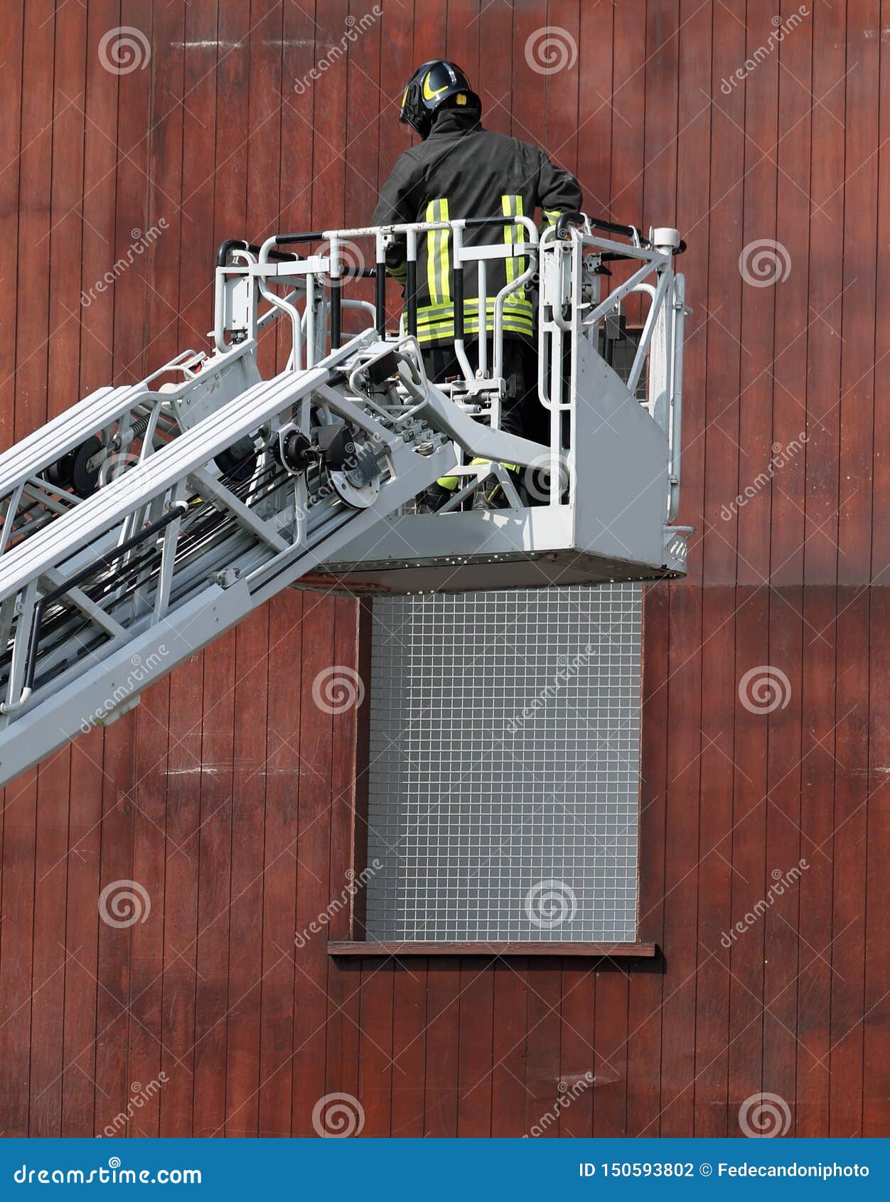 Fireman on the Aerial Platform Stock Photo - Image of mission ...