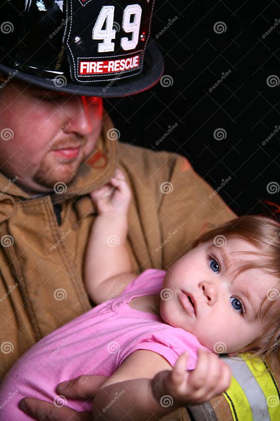 Fireman and Child stock photo. Image of heroism, family - 6731958