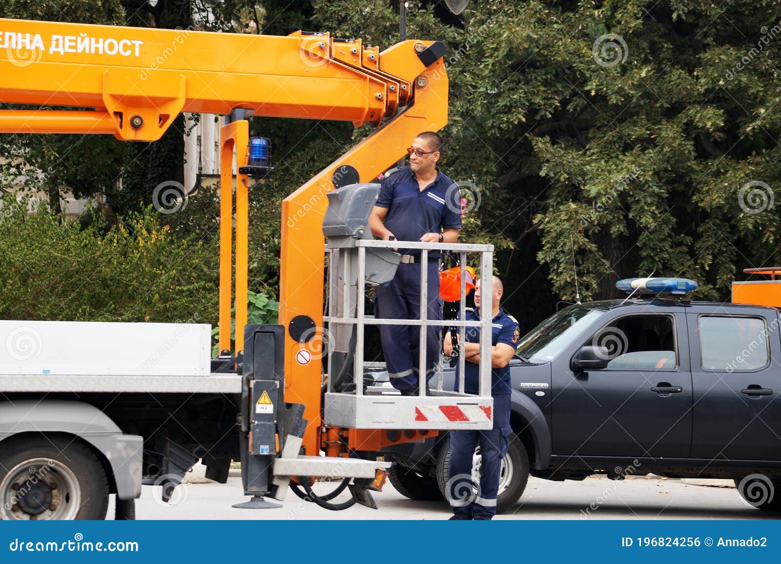 Fireman in a Cradle with a Control Panel Editorial Photo - Image of ...