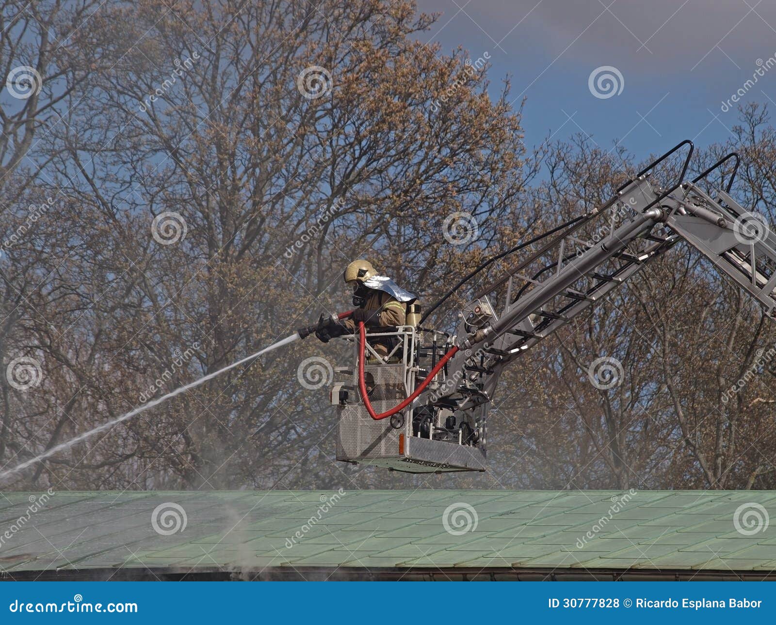 Fireman on crane editorial stock photo. Image of heat - 30777828