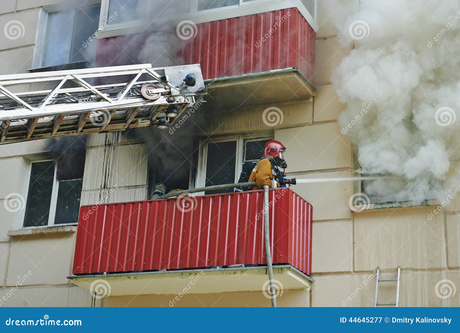 Fireman extinguish a fire stock image. Image of flame - 44645277