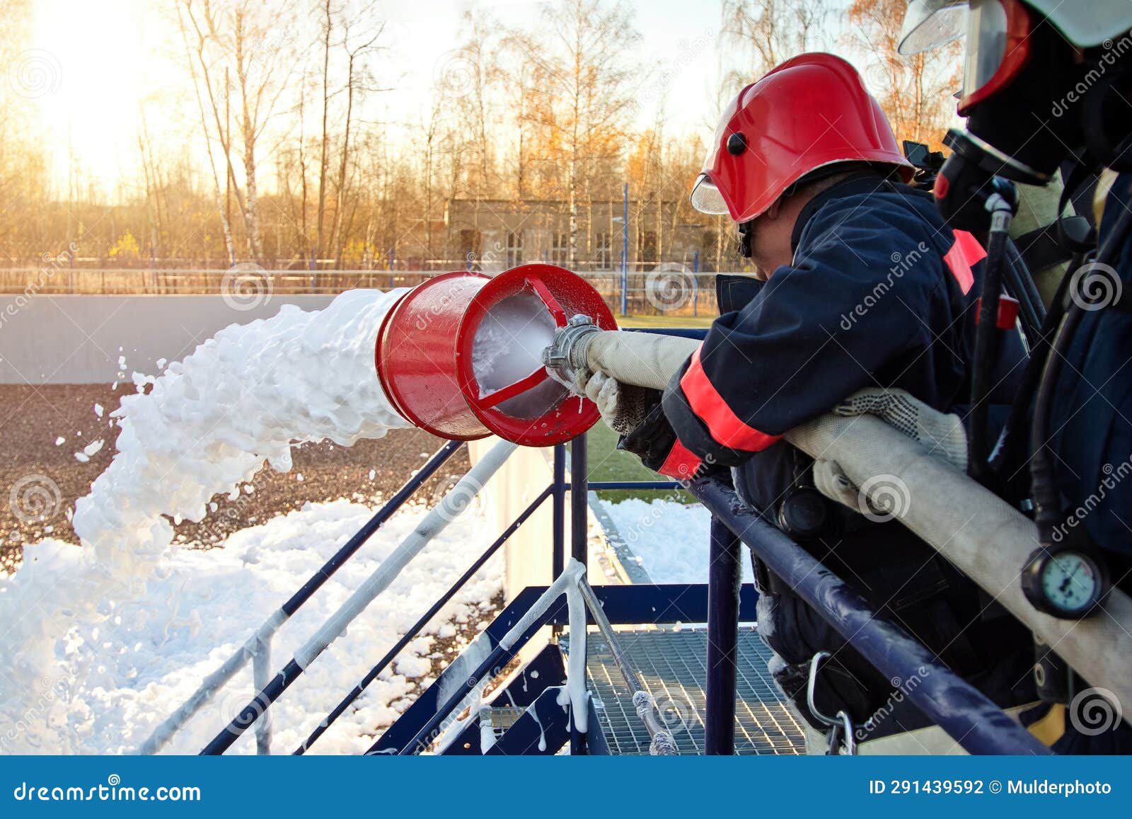Fireman Extinguish Fire by Foam Spraying Hose Editorial Photography ...
