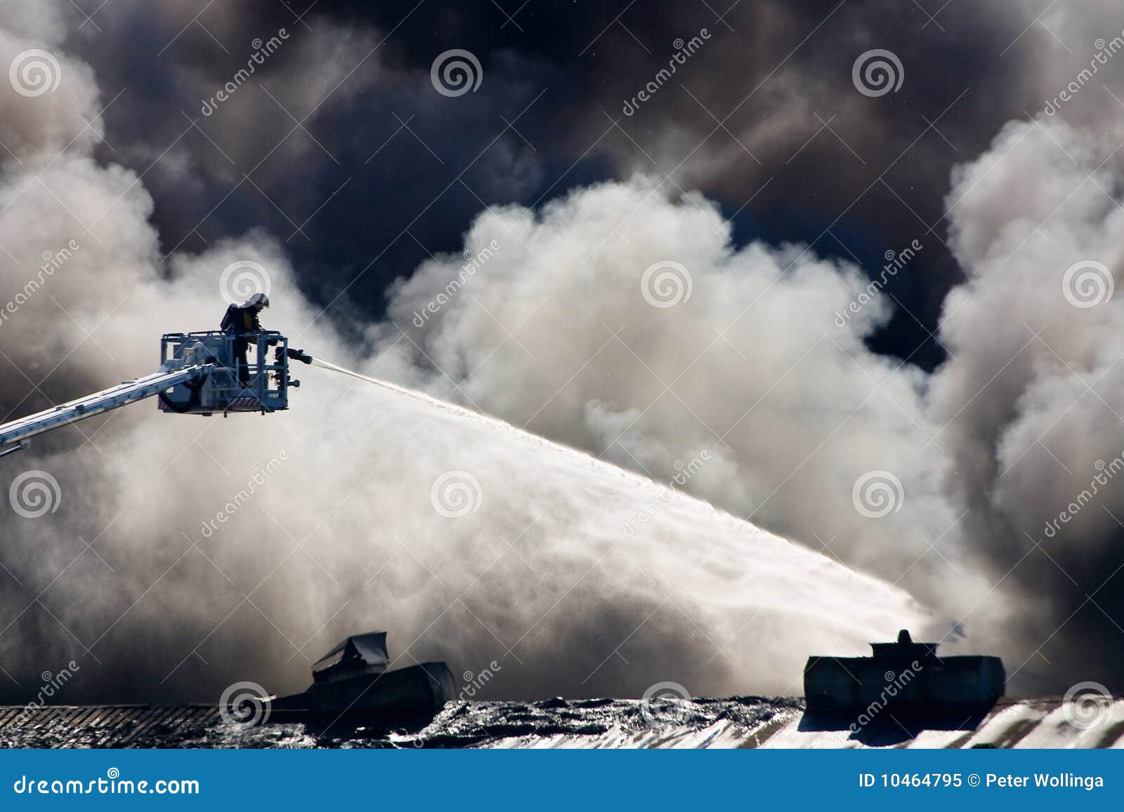 Fireman Fighting Against Fire with a Water Canon Stock Image - Image of ...