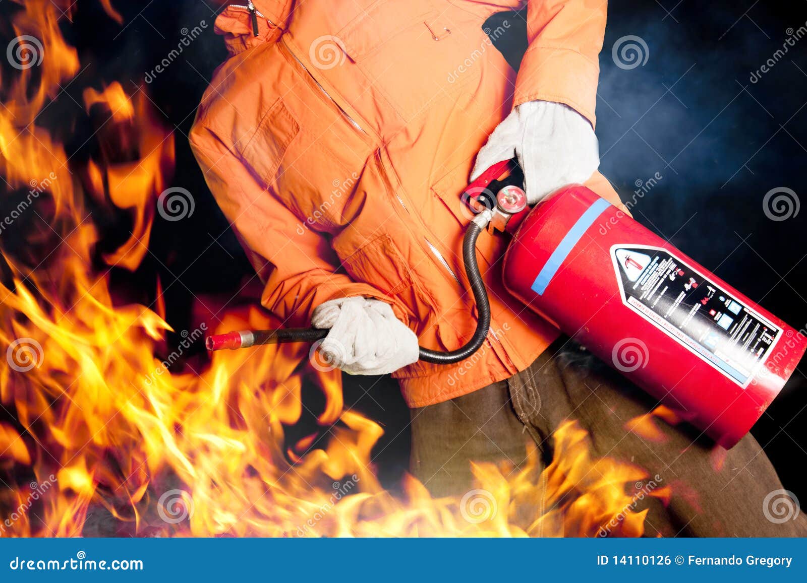 Fireman Fighting a Raging Fire with Big Flames Stock Photo - Image of ...