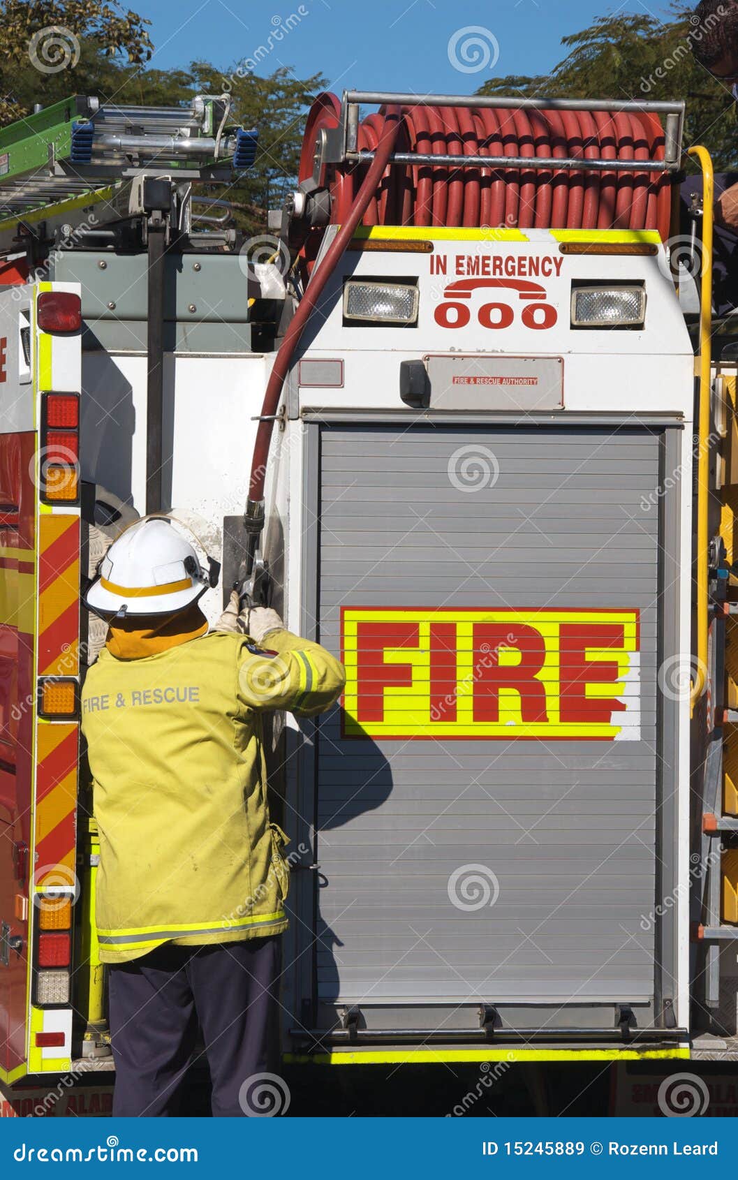 Fireman and Fire Engine stock image. Image of outdoors - 15245889