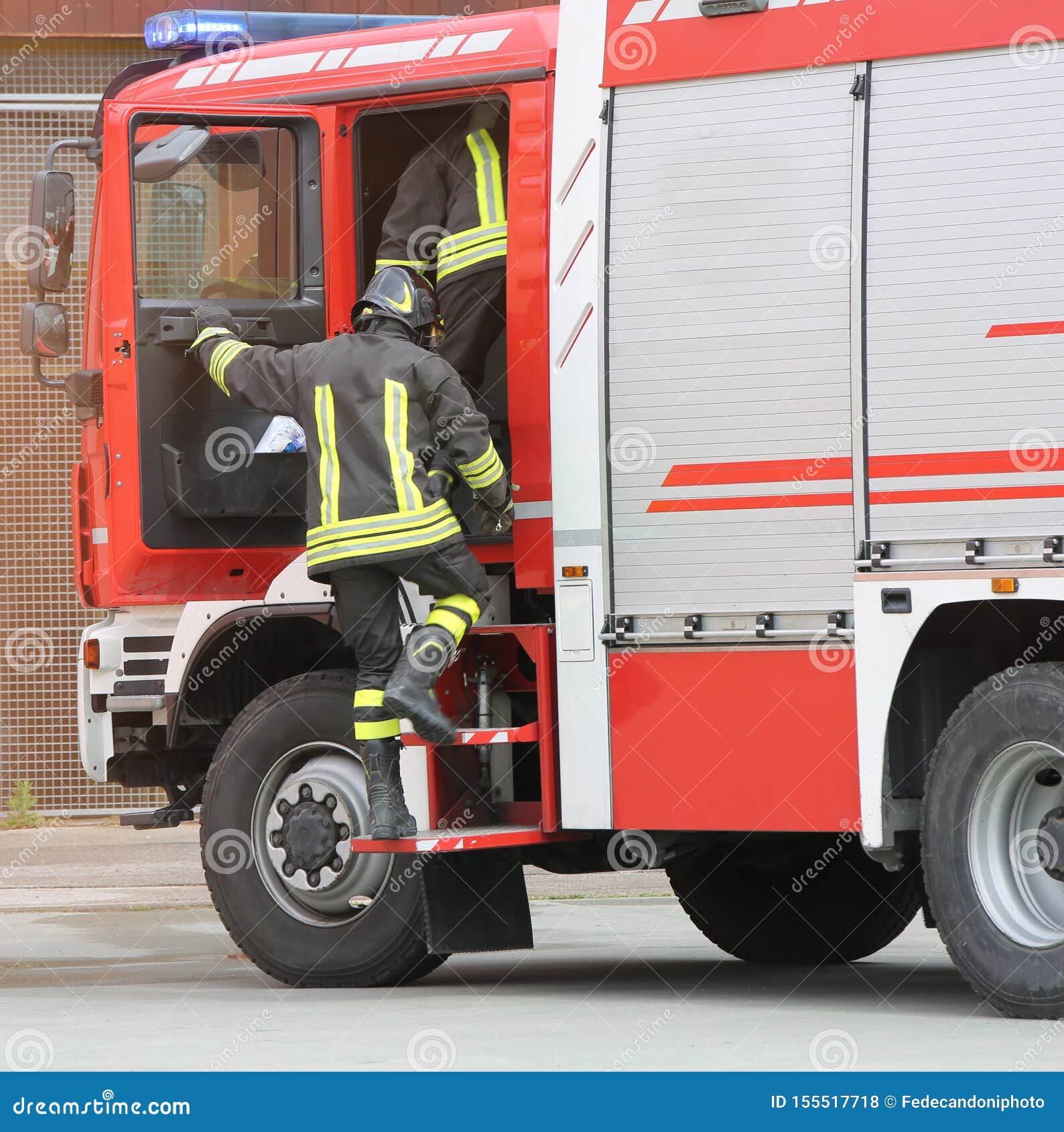 Fireman and the Fire Engine Stock Photo - Image of fireman, fuoco ...