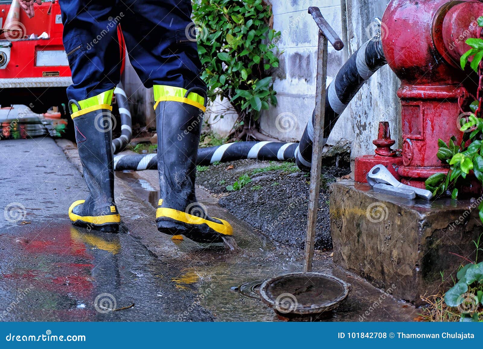 Fireman with Fire Hydrant stock photo. Image of pressure - 101842708