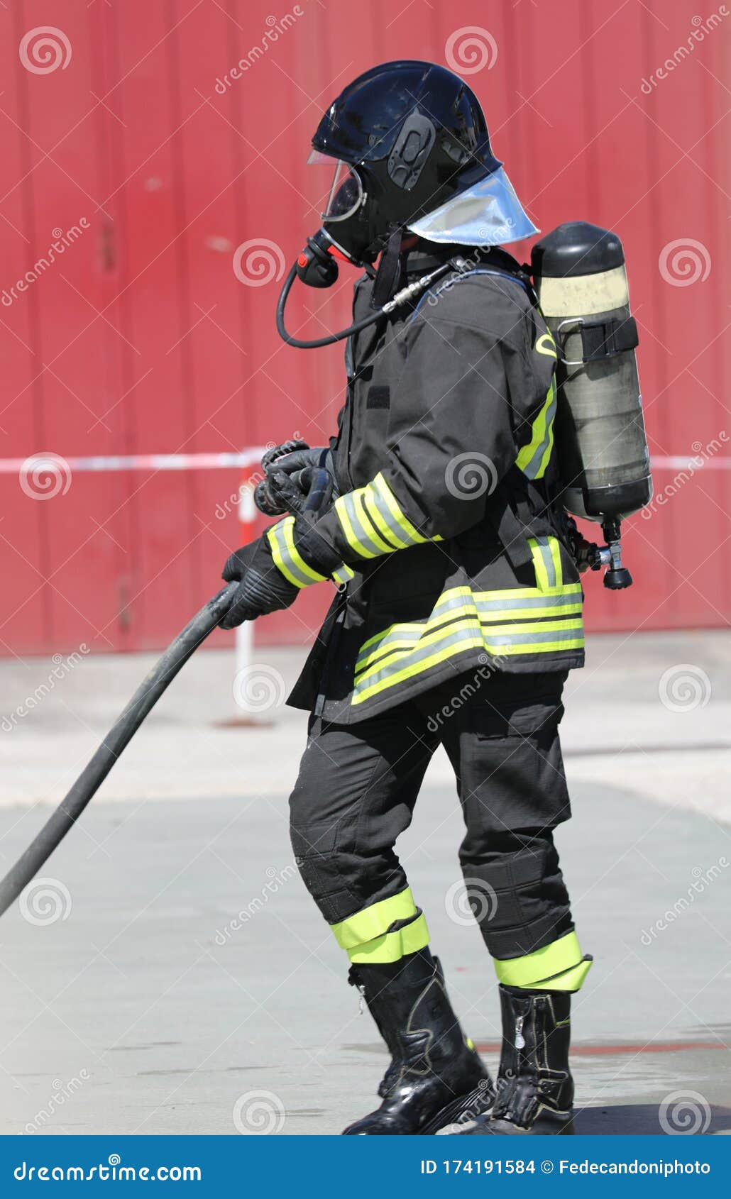 Fireman with Hardhat and Oxygen Cylinder with Respirator Stock Photo ...