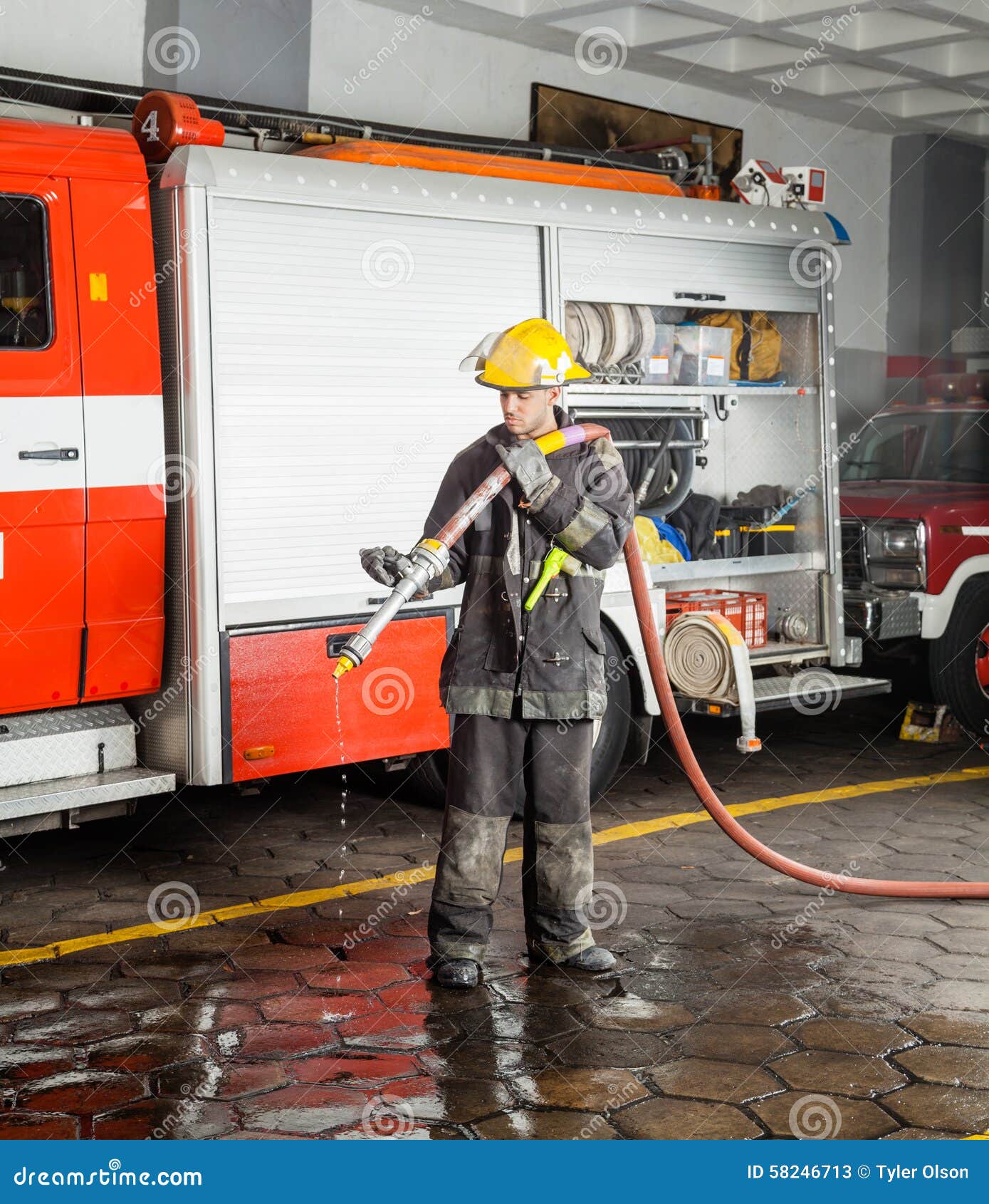 Fireman Holding Water Hose during Training Stock Image - Image of ...
