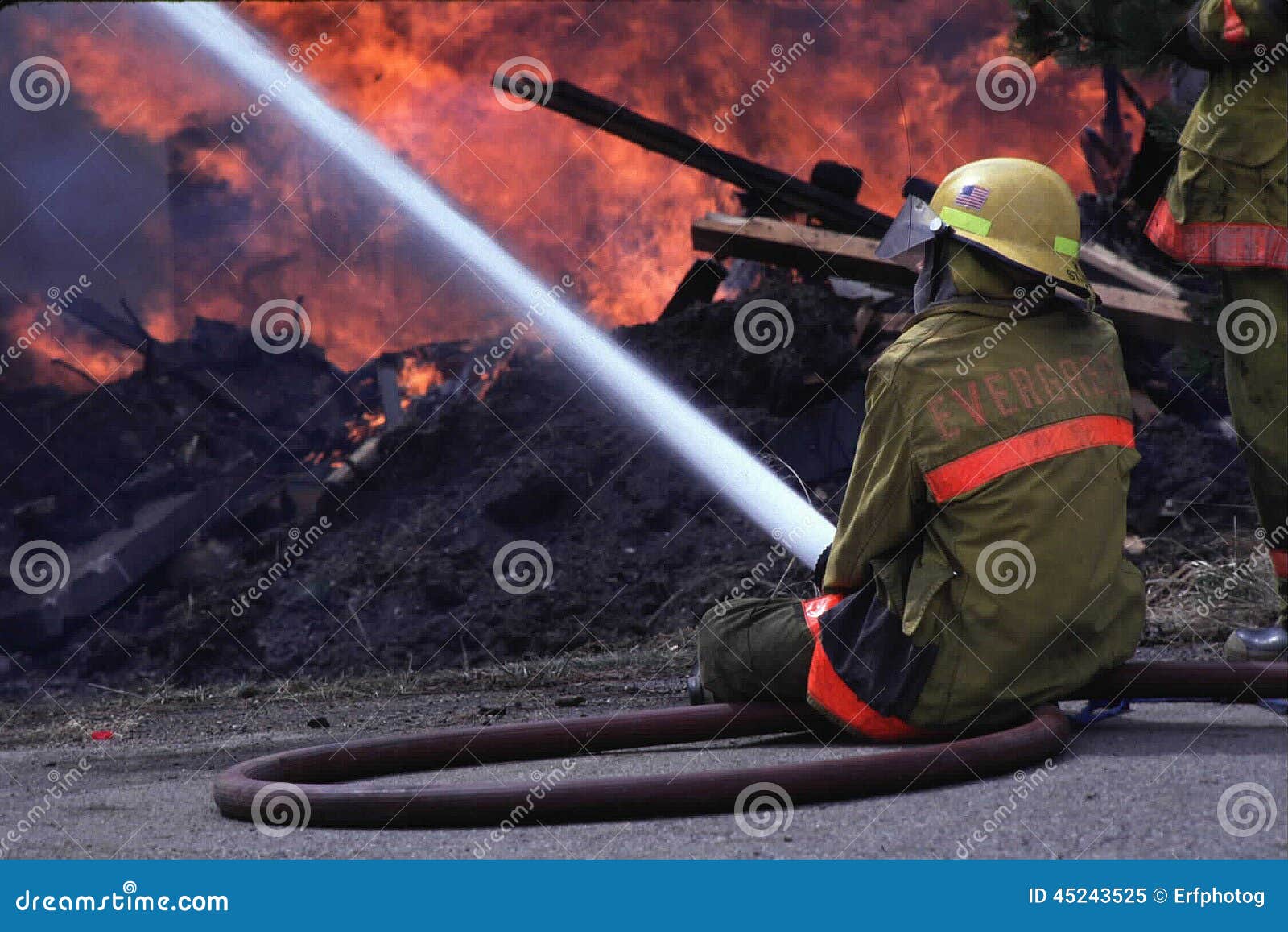 Fireman with hose editorial image. Image of bravery, fireman - 45243525