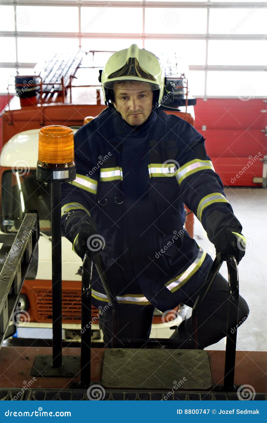 Fireman on the ladder stock image. Image of indoor, ministry - 8800747
