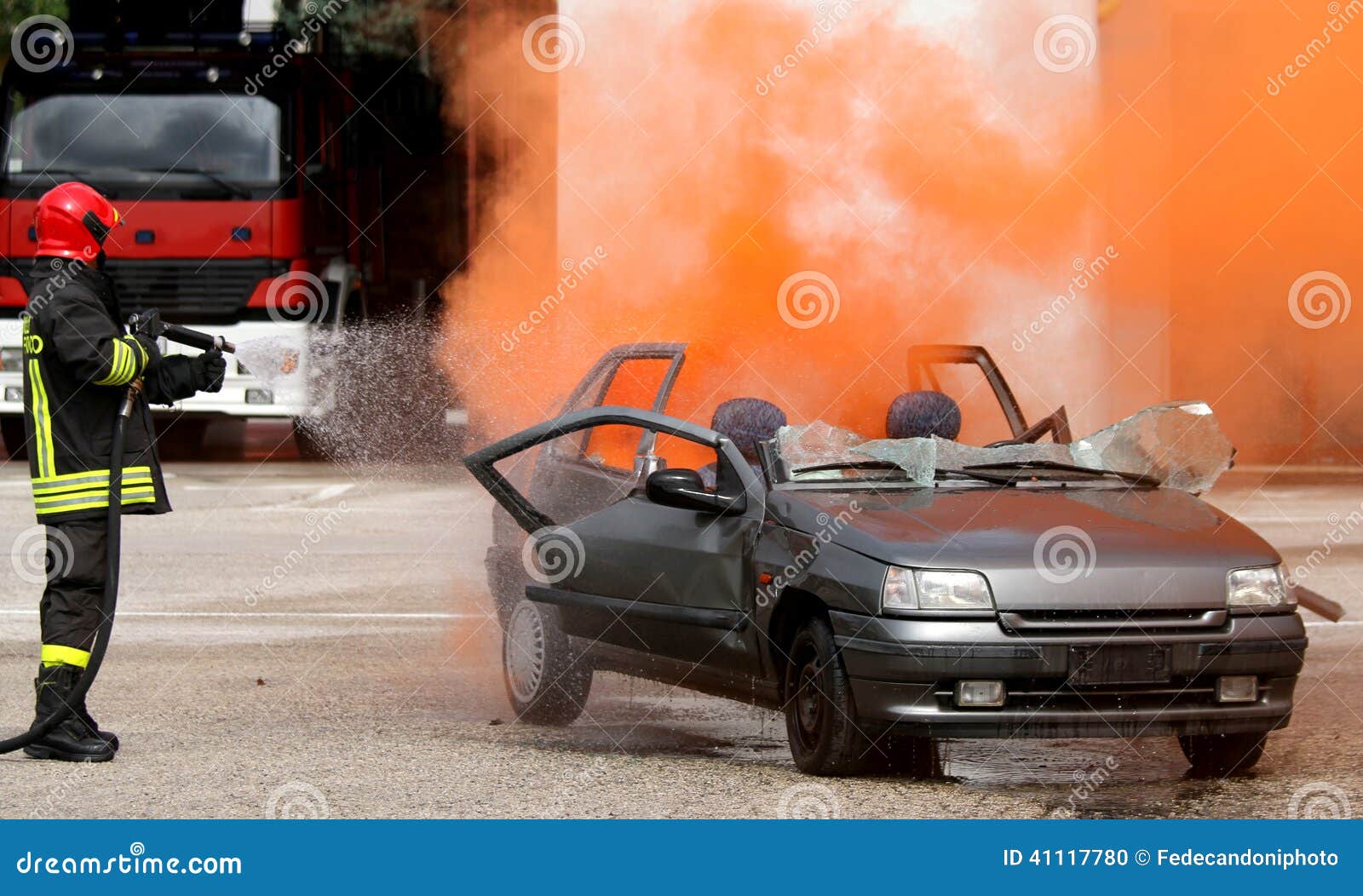 Fireman while Off a Fire of a Car Stock Photo - Image of firefighters ...
