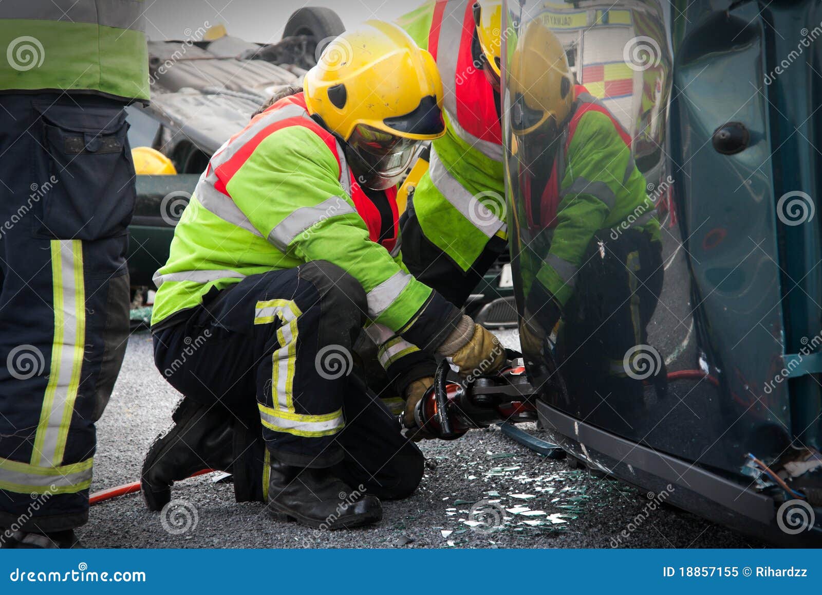 Fireman with Power Wedge at Car Crash Stock Image - Image of automobile ...
